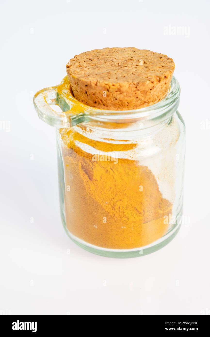 Ground turmeric in a glass jar hi-res stock photography and images - Alamy