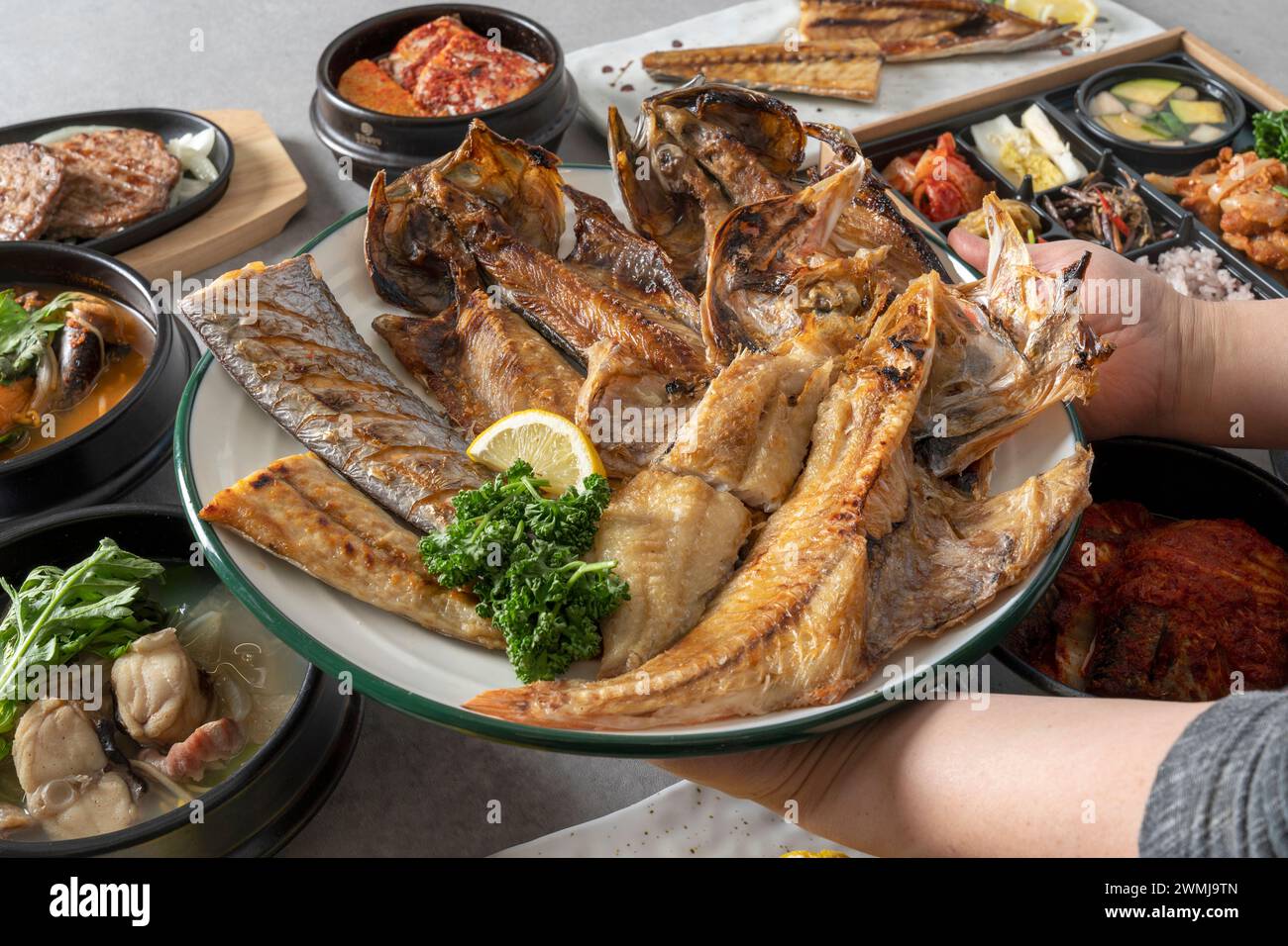 Soybean paste stew, rice, grilled fish, braised kimchi mackerel Korean ...
