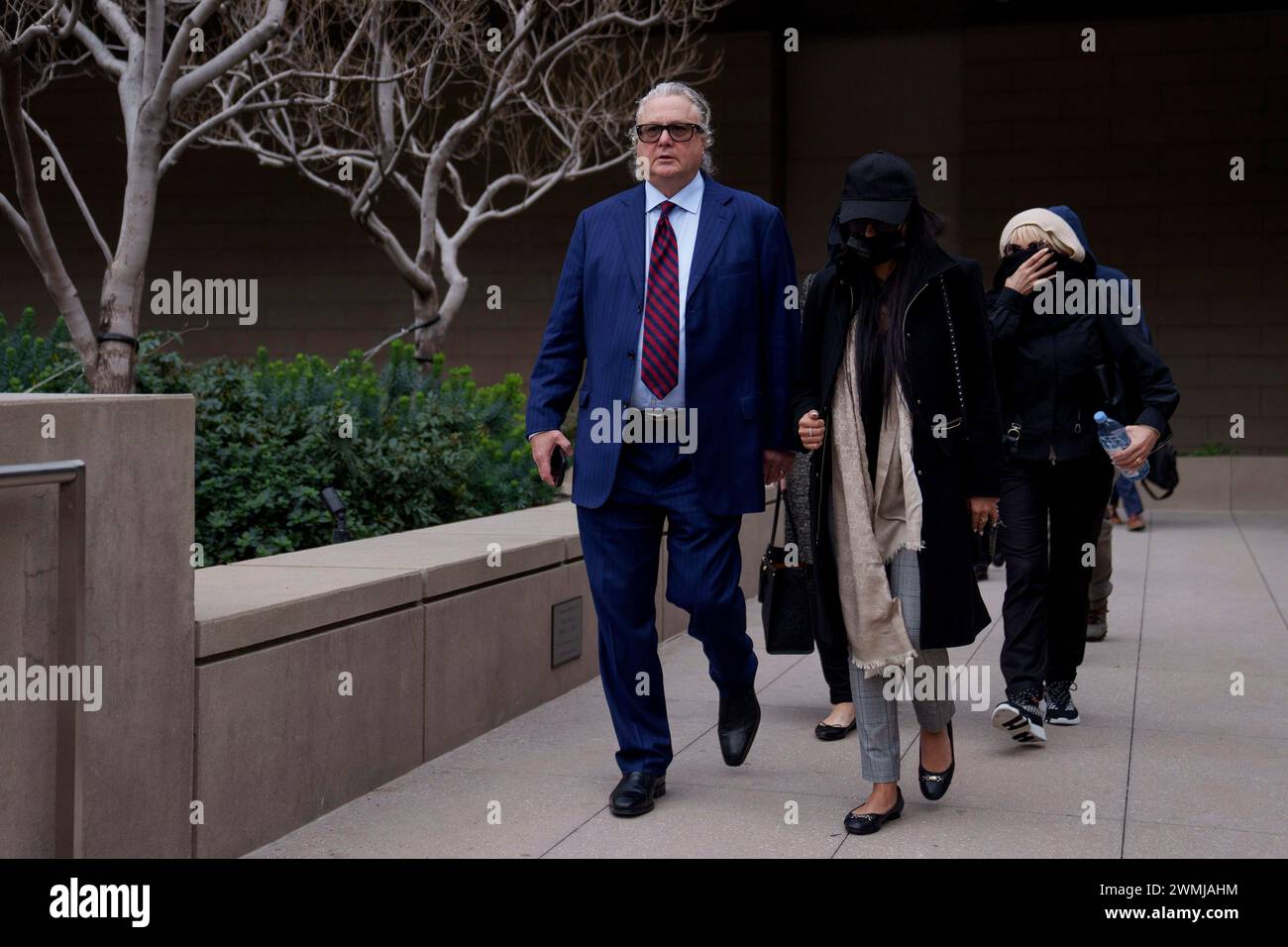 David Chesnoff, left, defense attorney for Alexander Smirnov, walks out ...