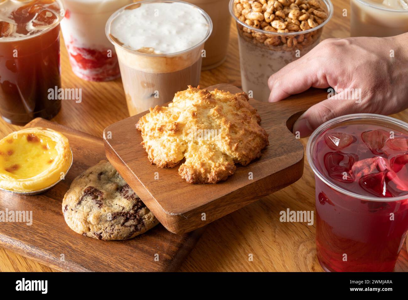 Strawberry latte, Jolly Pong shake, scones, cookies, coffee Stock Photo ...