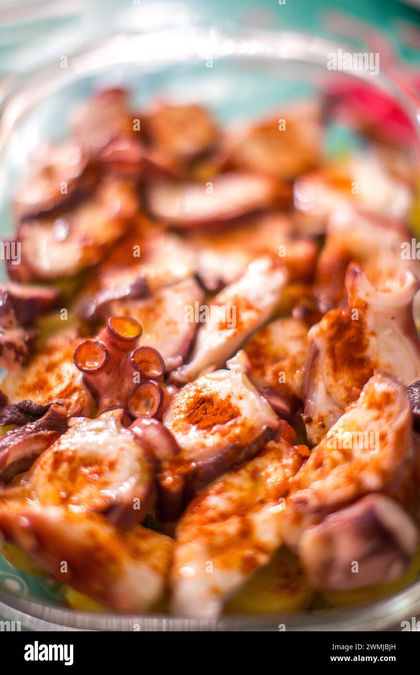 Sliced octopus seasoned with paprika, a classic Spanish dish Stock ...