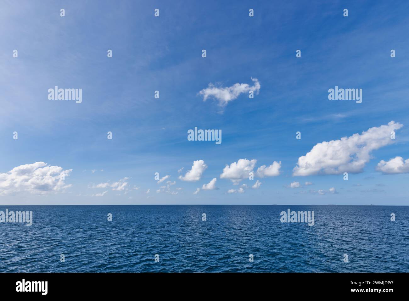 Crystal clear sea water bay. Pristine ocean lagoon sunny cloudy sky ...