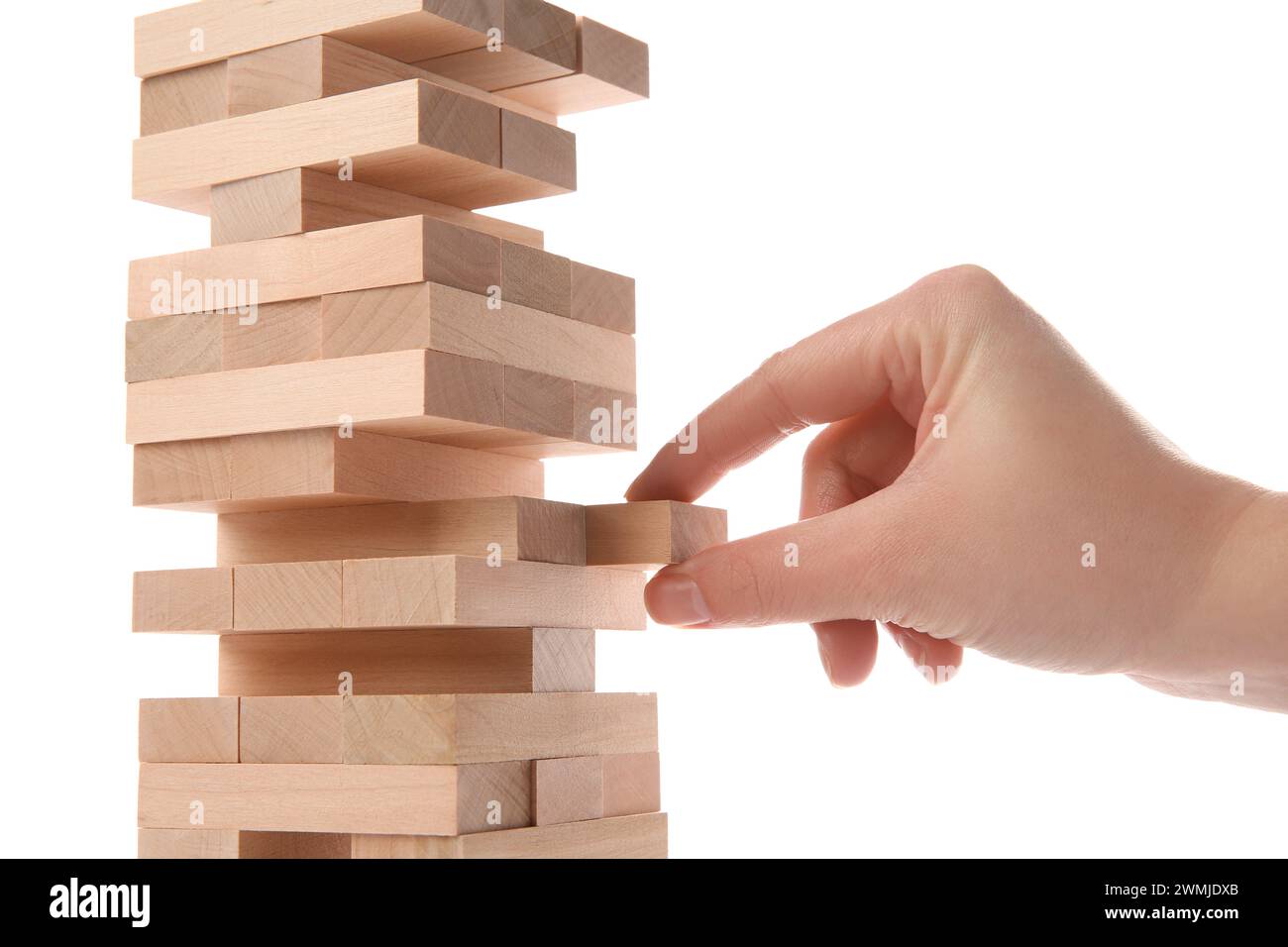 Woman playing Jenga on white background, closeup Stock Photo - Alamy