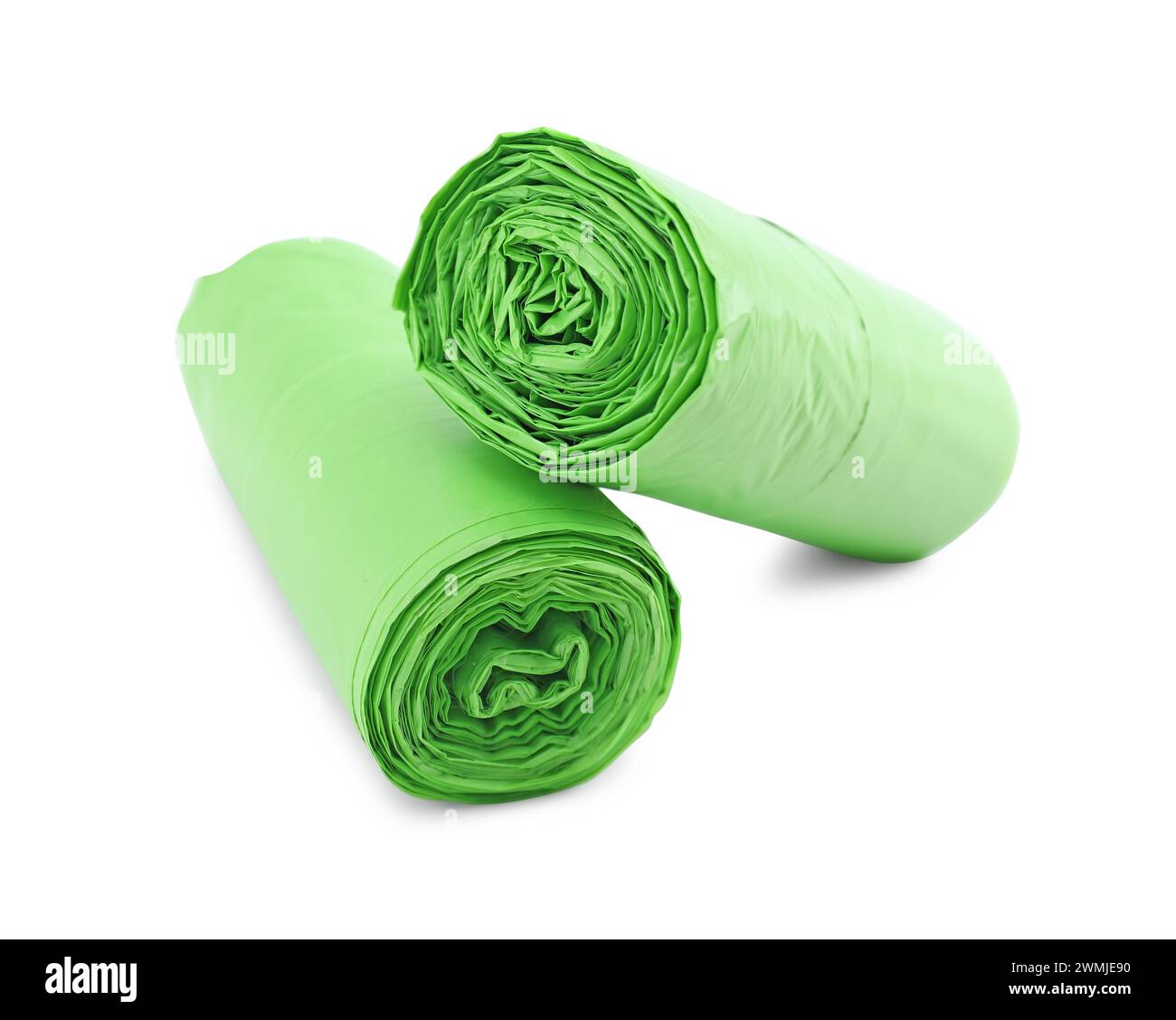 Two rolls of light green garbage bags isolated on white Stock Photo - Alamy