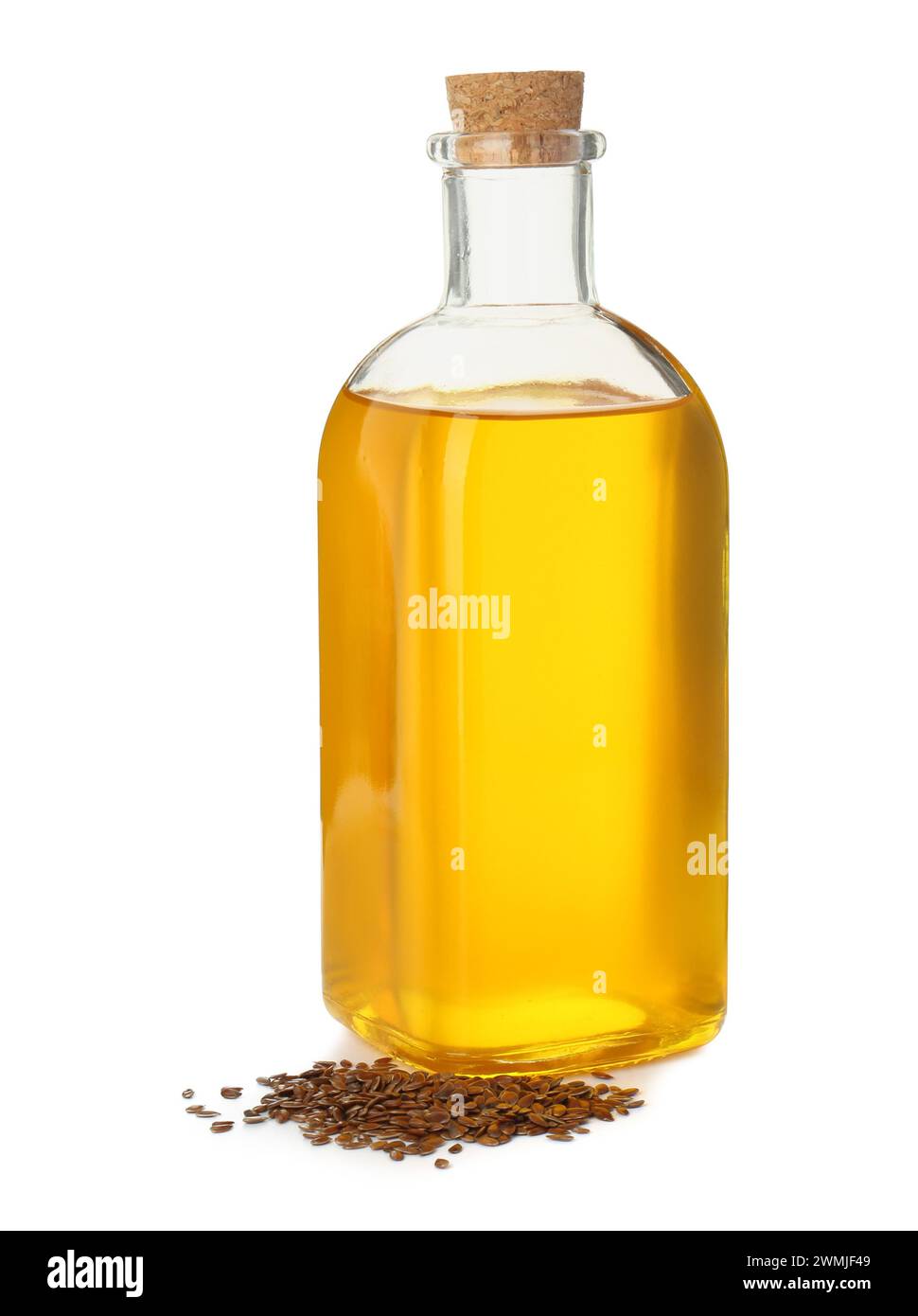 Vegetable fats. Flax oil in glass bottle and seeds isolated on white ...