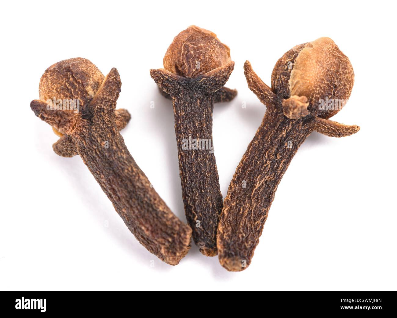 three Cloves isolated on white background Stock Photo - Alamy