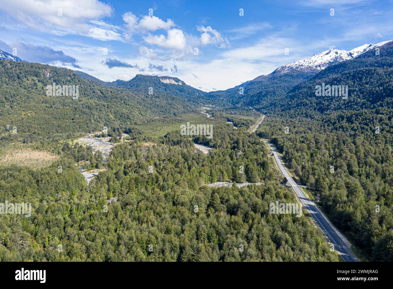 Aerial view of the road Carretera Austral west of lake Lago Yelcho ...