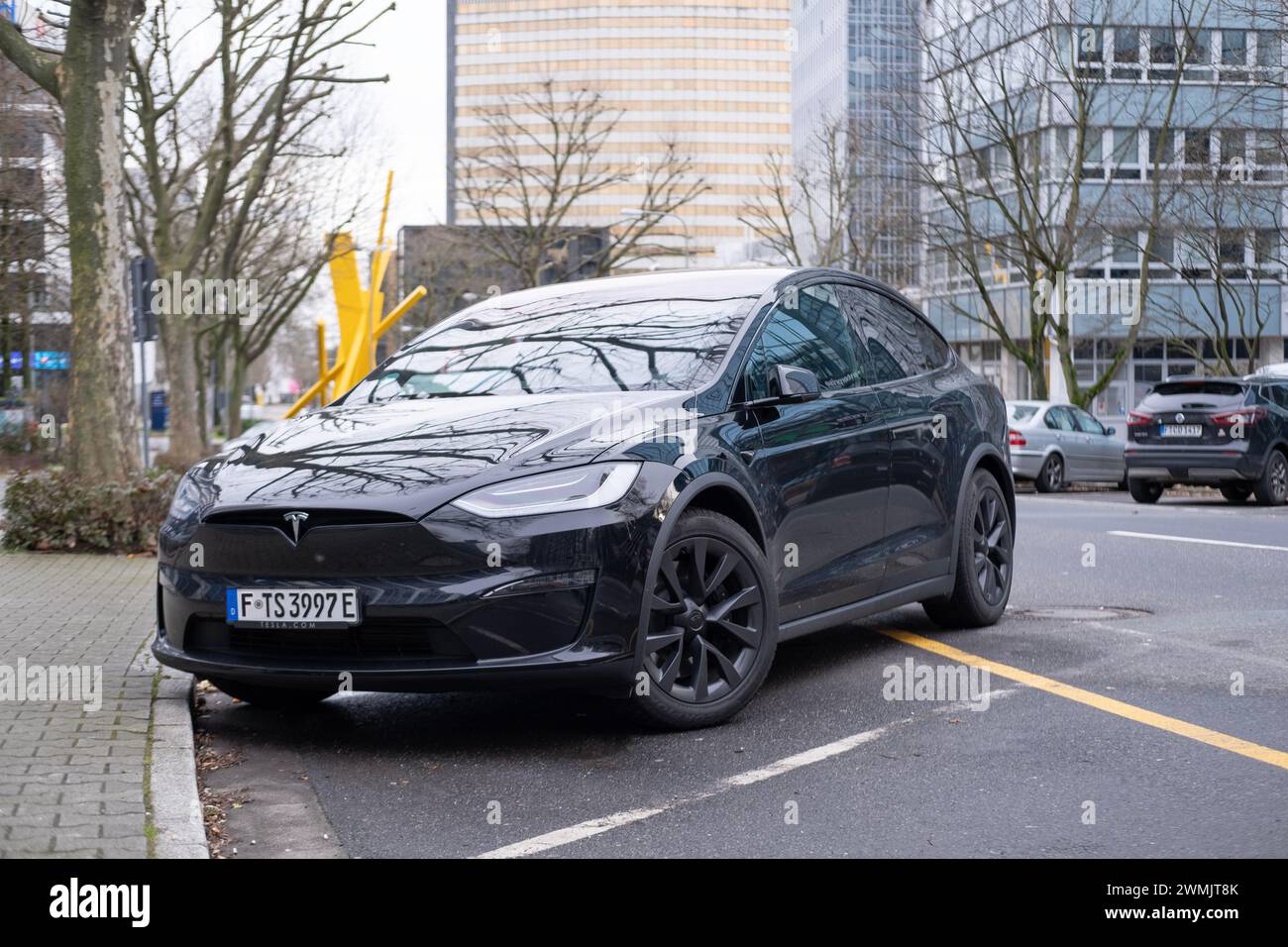 black electric car tesla, Model X parked on street, popular Elektro-SUV ...