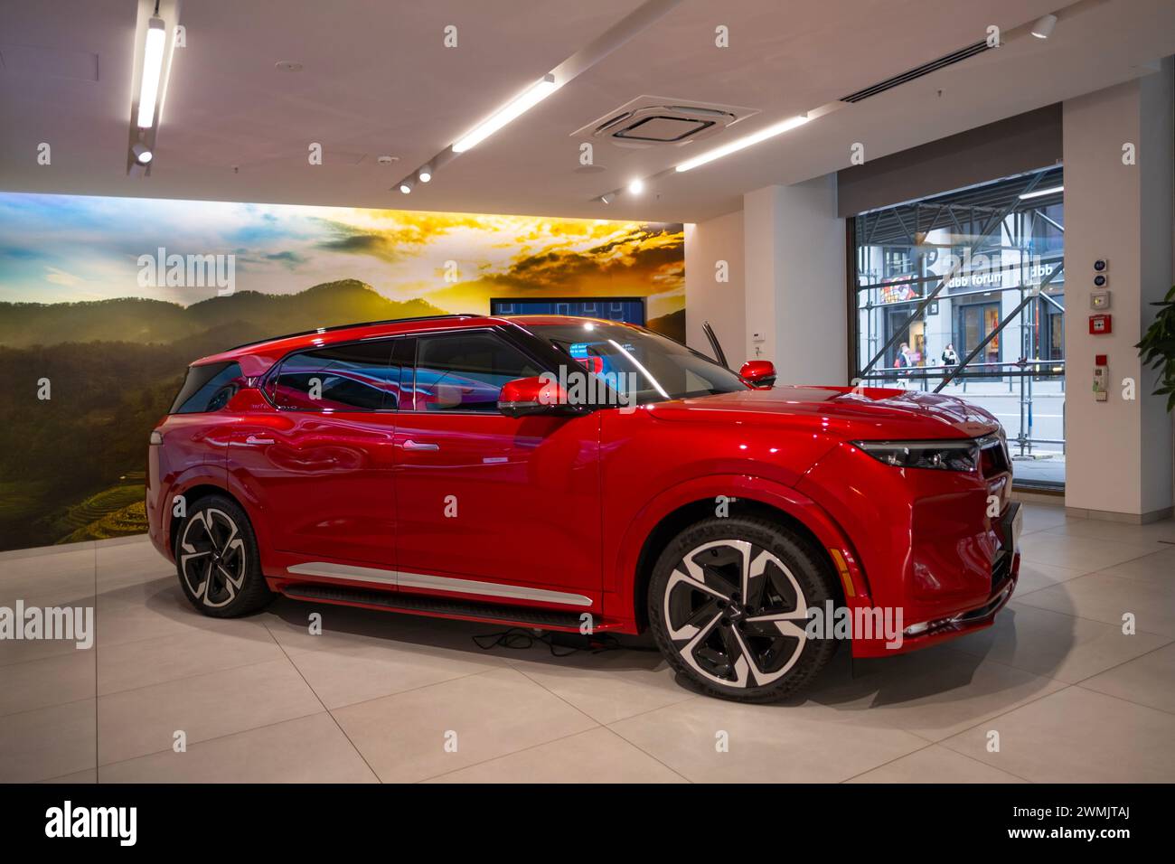 new red Vinfast vf 9 electric SUV in Studio, advanced technologies in ...