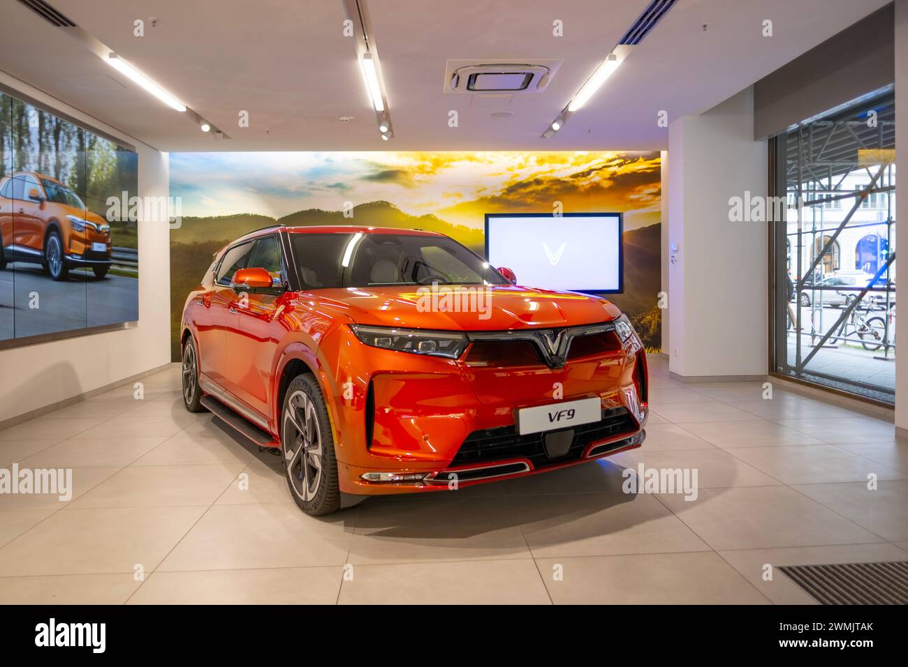 new red Vinfast vf 9 electric SUV in Studio, advanced technologies in ...