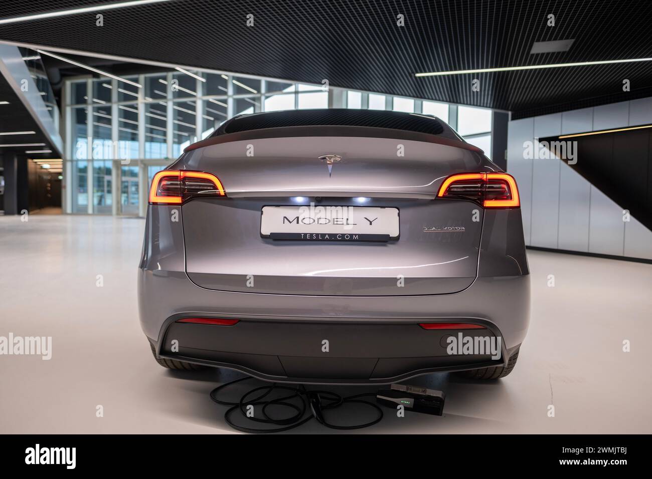 new grey electric tesla model y performance quicksilver rear view ...