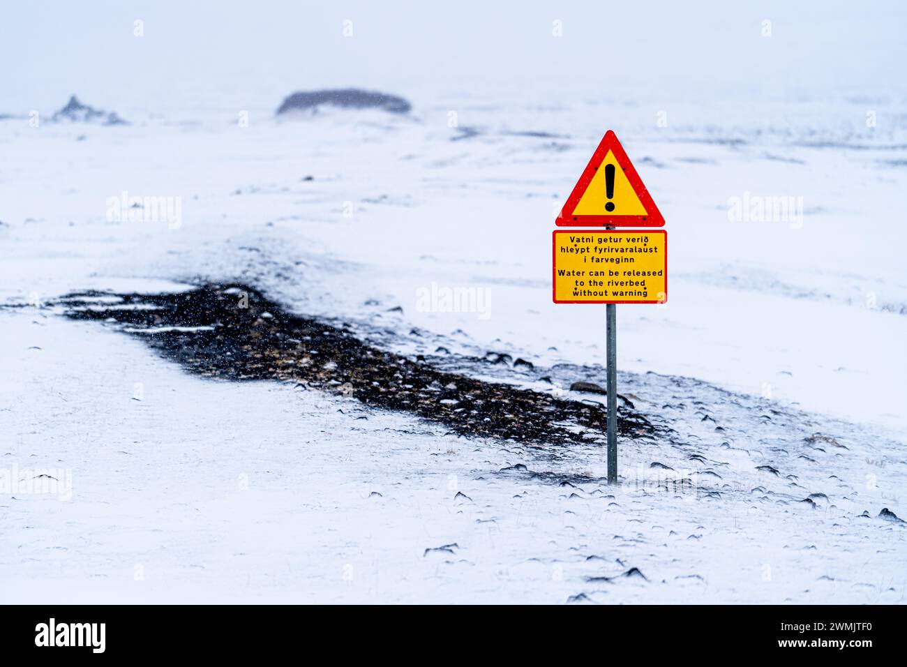 River flow growth traffic sign in Iceland in winter Stock Photo - Alamy