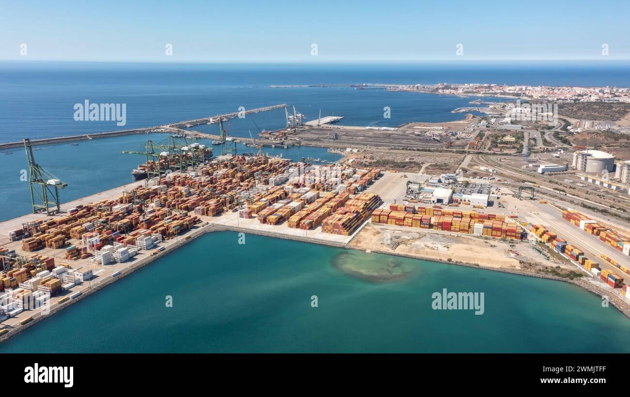 Aerial view of container cargo terminal of commercial port, business ...