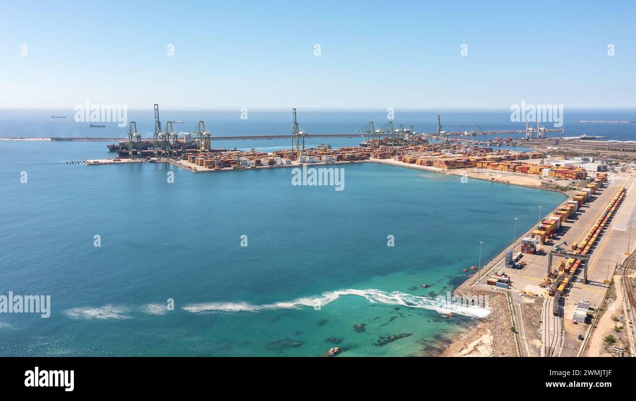 Aerial view of container cargo terminal of commercial port, business ...