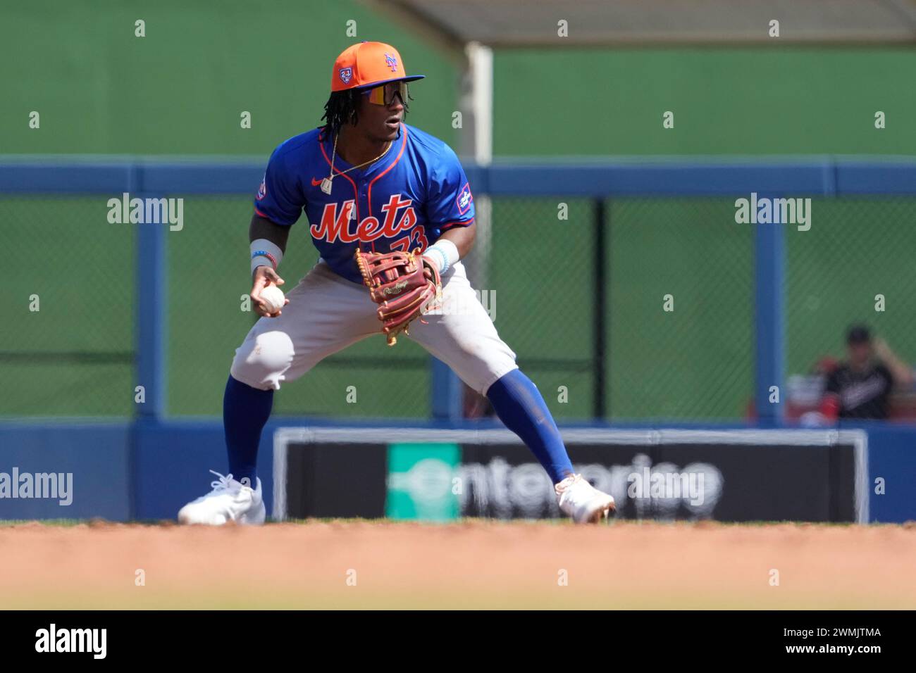 New York Mets second baseman Luisangel Acuna throws to first during the ...