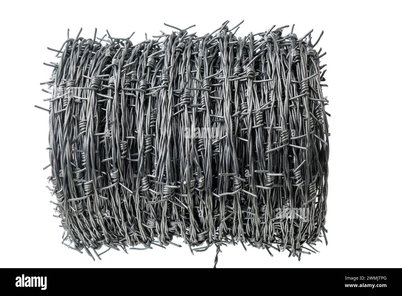 Roll barbed wire close-up on white isolated background for creating ...