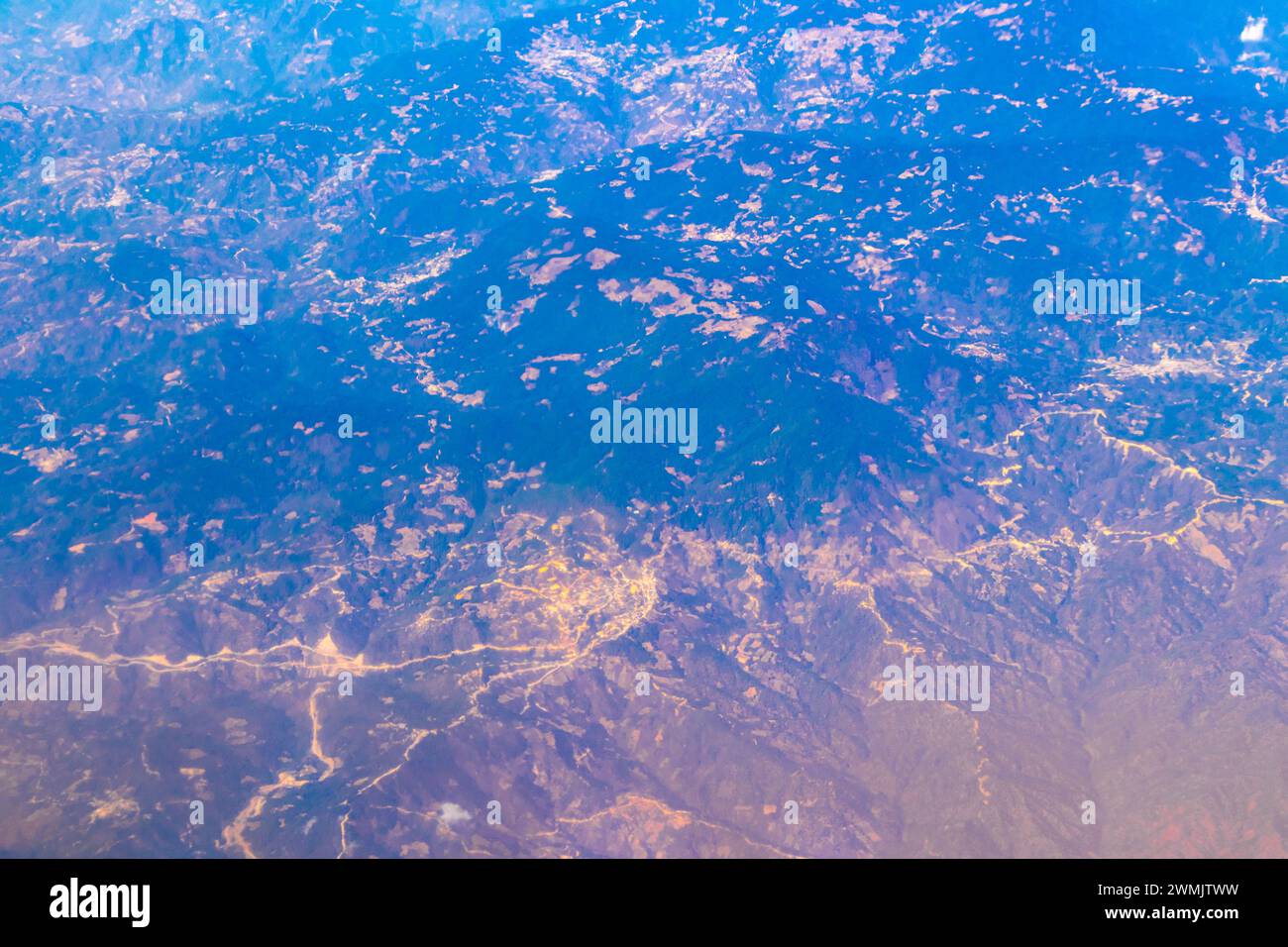 Flying in an airplane over Mexico Clouds Sky Volcanoes Mountains City ...