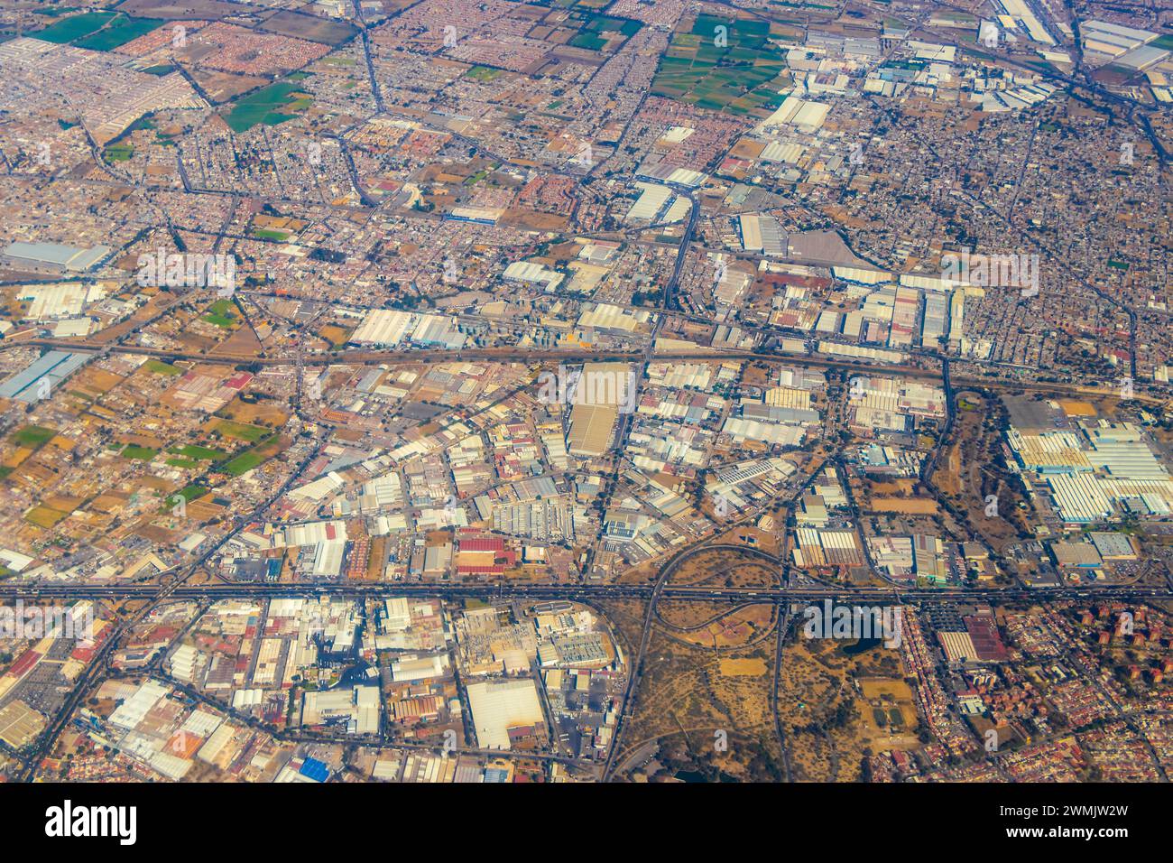 Flying in an airplane over Mexico Clouds Sky Volcanoes Mountains City ...