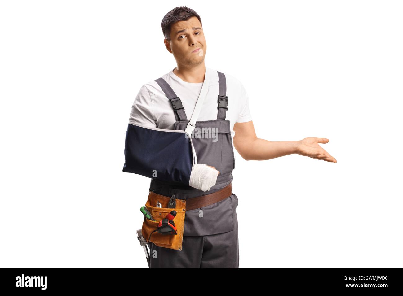Disappointed worker in a uniform with a broken arm isolated on white ...