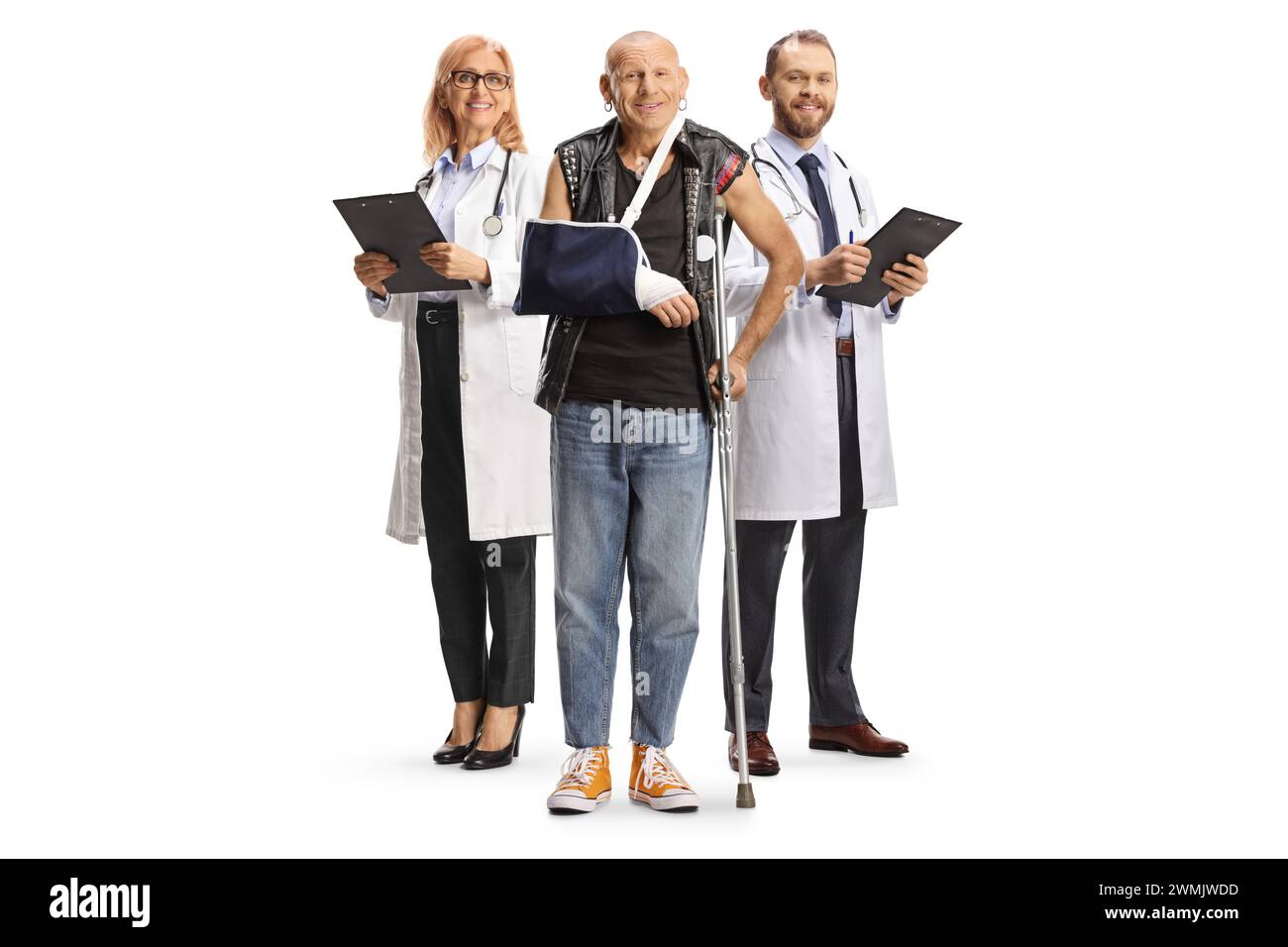 Injured man with a crutch standing in front of a male and female ...