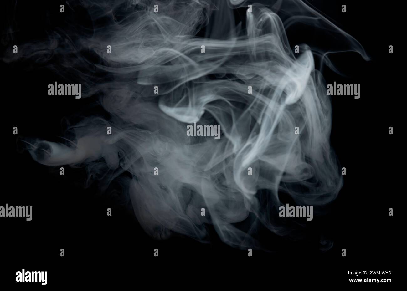 Grey smoke. Cigarette smoke on a black background Stock Photo - Alamy