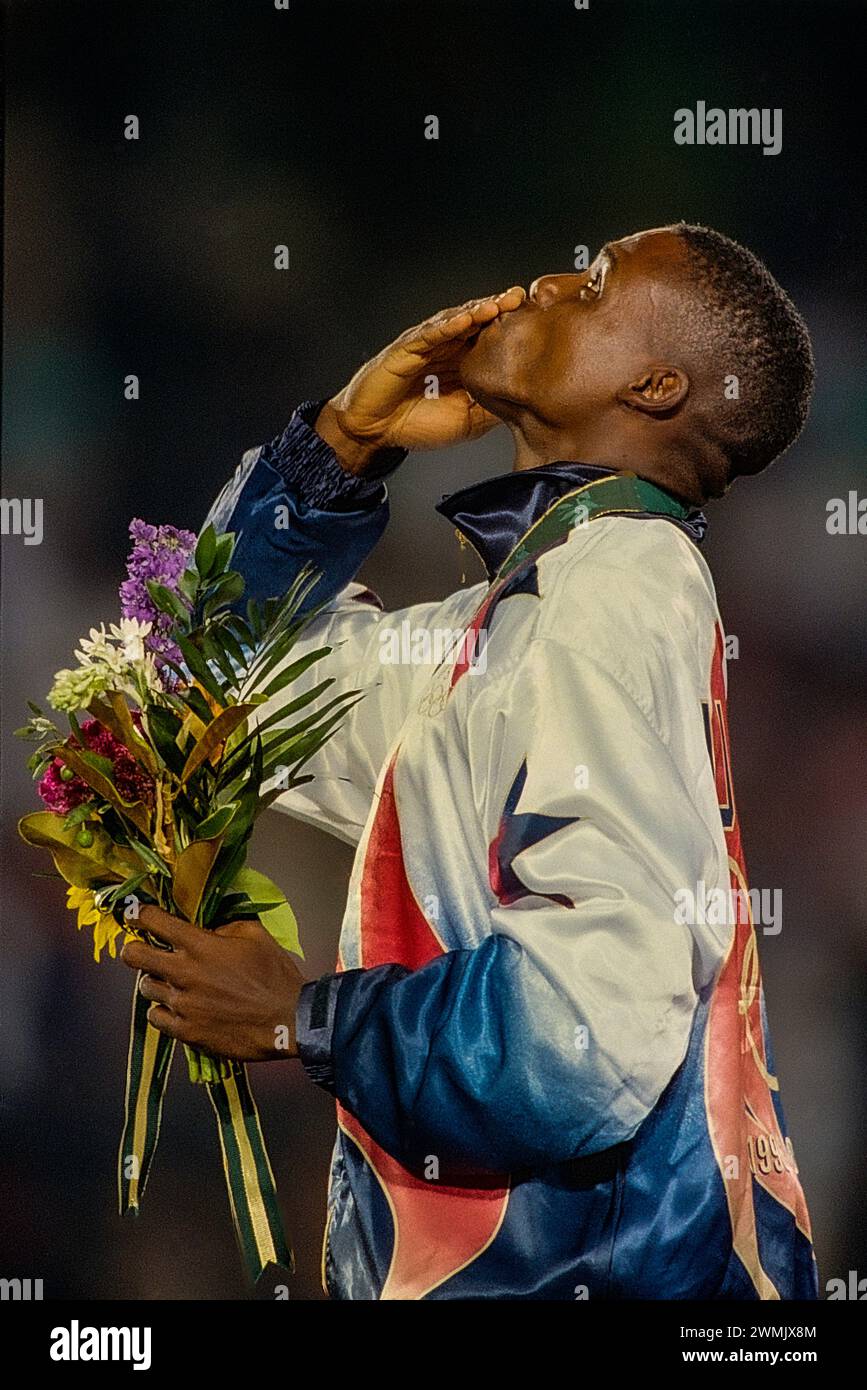 Carl Lewis (USA) win the gold medal in the long jump at the 1996 ...