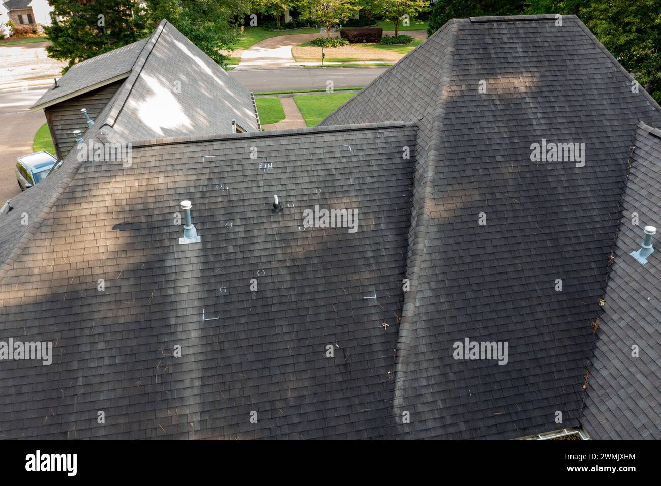 Roof with hail damage and chalk markings from inspection Stock Photo ...