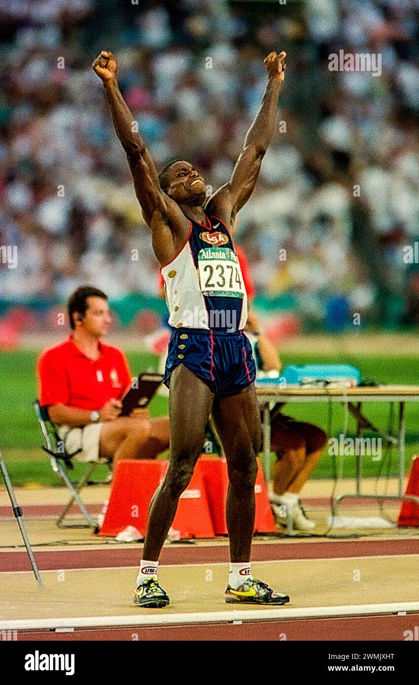 Carl Lewis (USA) win the gold medal in the long jump at the 1996 ...