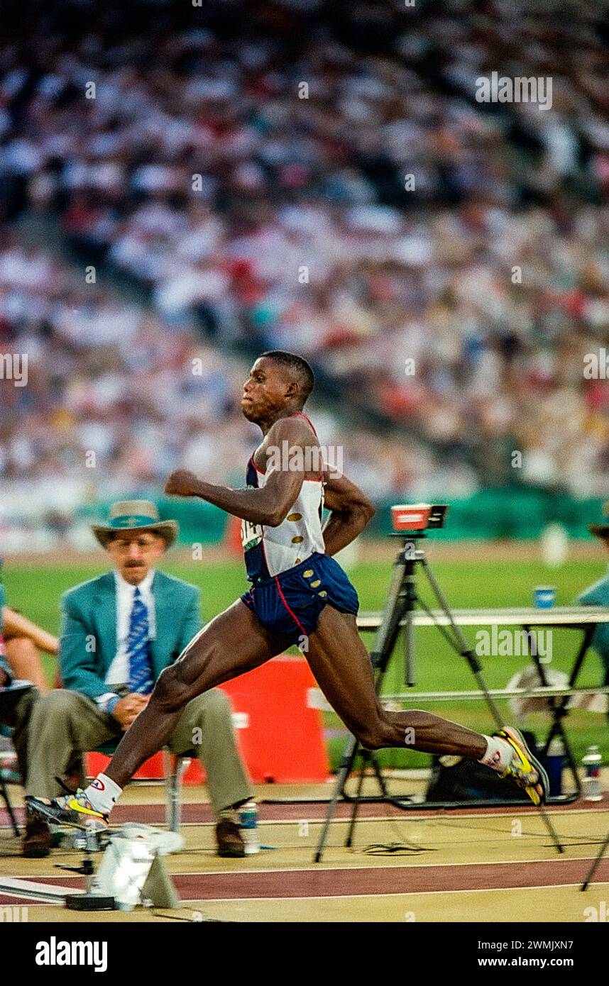 Carl Lewis (USA) win the gold medal in the long jump at the 1996 ...