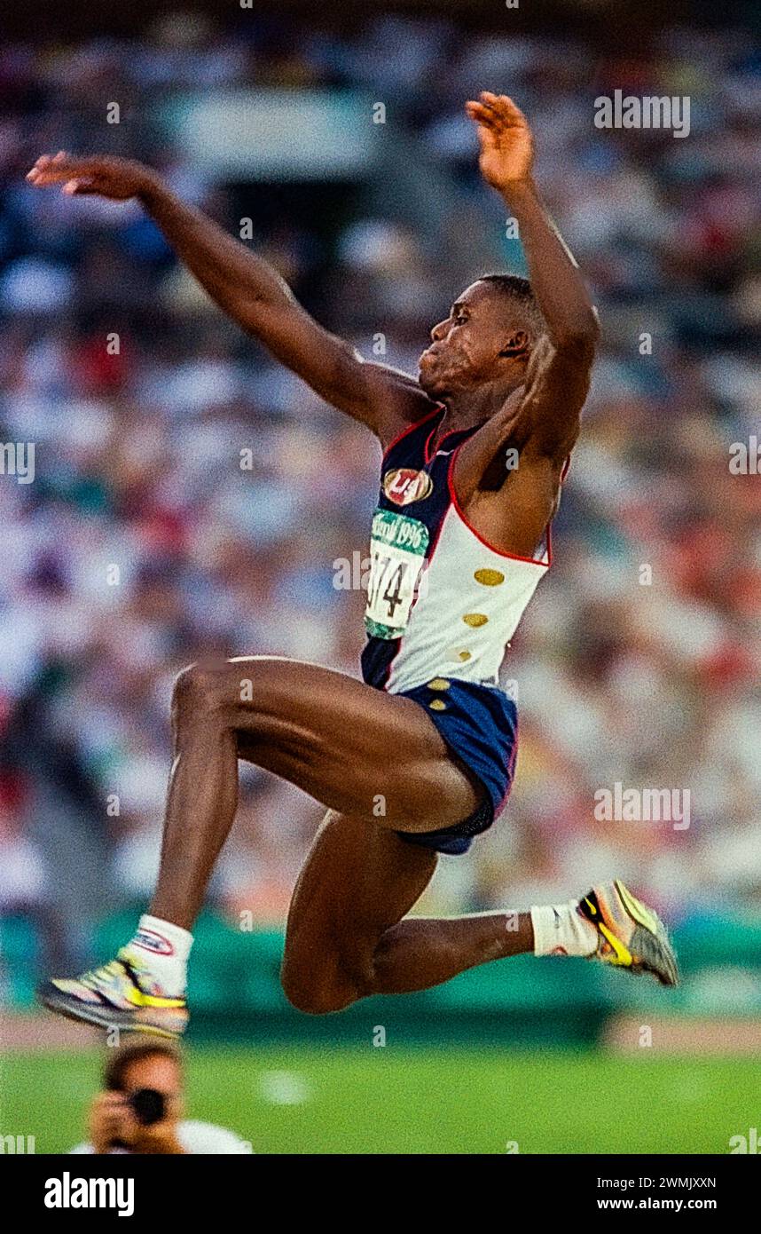 Carl Lewis (USA) win the gold medal in the long jump at the 1996 ...