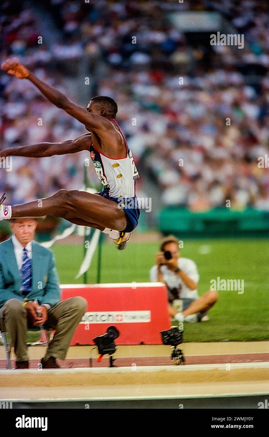 Carl Lewis (USA) win the gold medal in the long jump at the 1996 ...