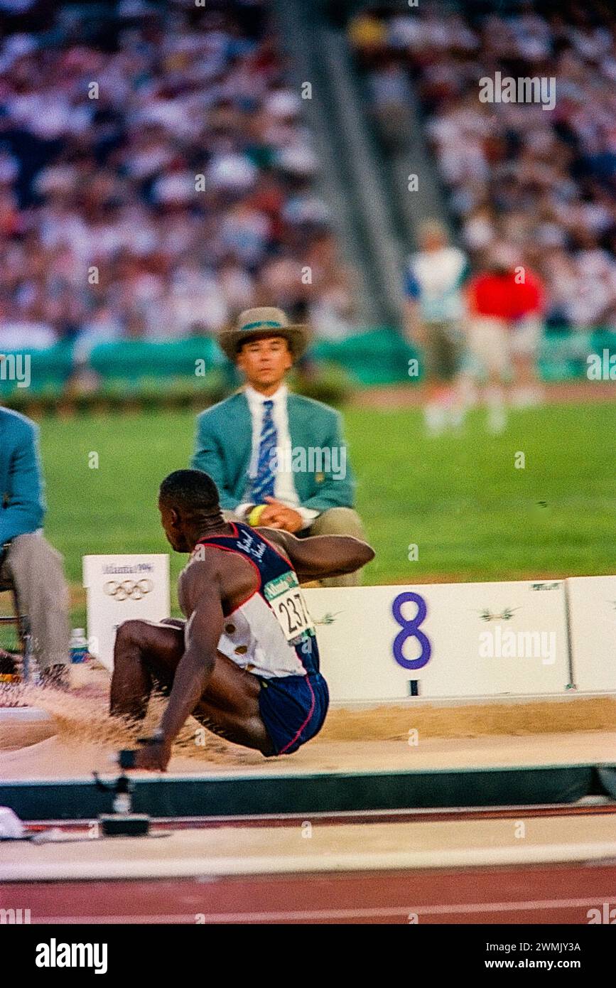 Carl Lewis (USA) win the gold medal in the long jump at the 1996 ...