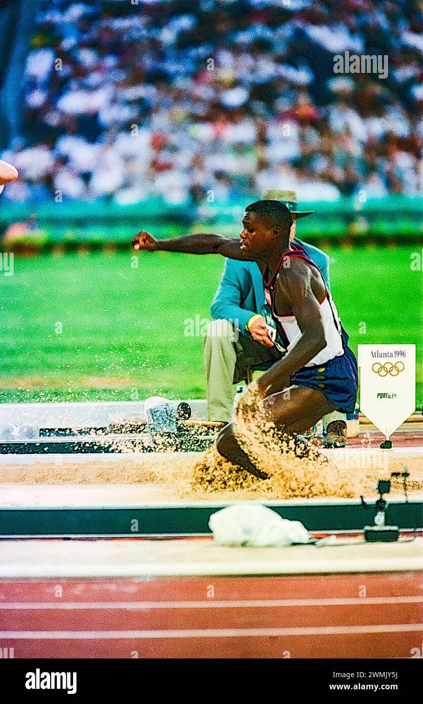 Carl Lewis (USA) win the gold medal in the long jump at the 1996 ...