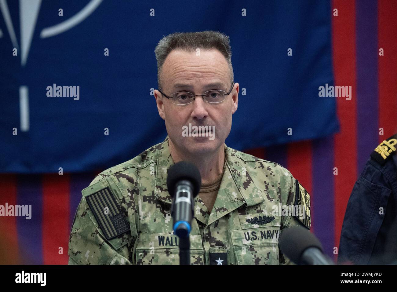 US Navy Rear Admiral Thomas Wall talks to reporters at a press ...