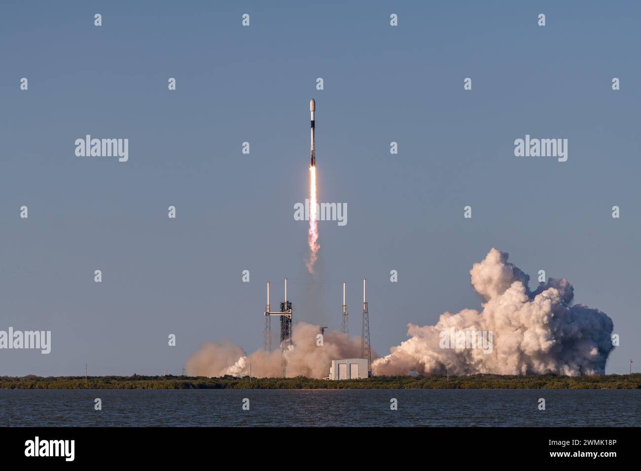 A Falcon 9 rocket carrying 24 Starlink satellites launches from Space ...