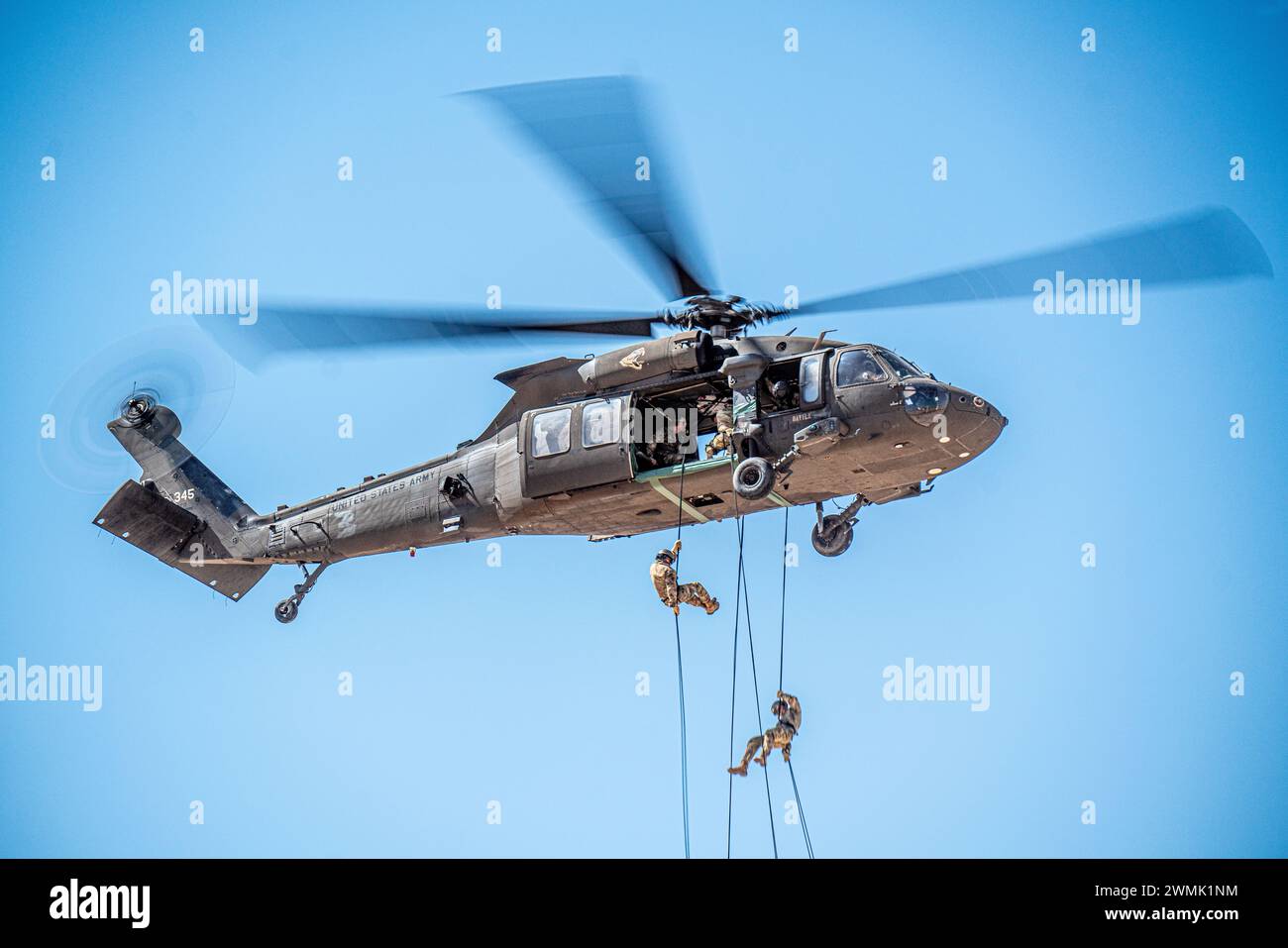 Air Assault candidates rappel out of a UH-60, February 22, 2024. After ...