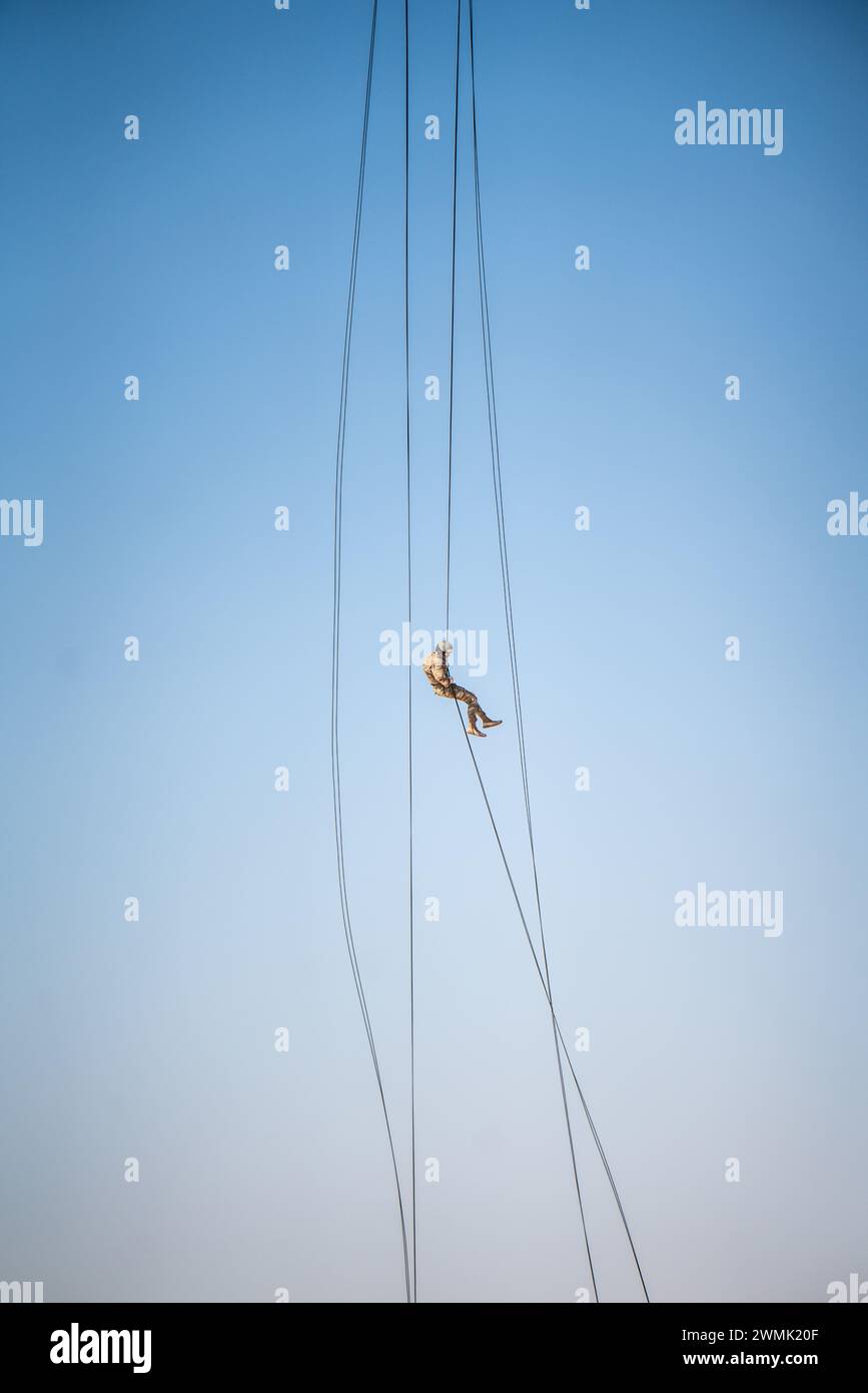 Air Assault candidates rappel out of a UH-60, February 22, 2024. After ...