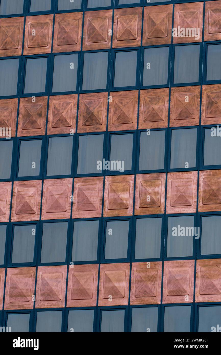 Bronze elegance.Modern Building Facade with Black Window Frames ...