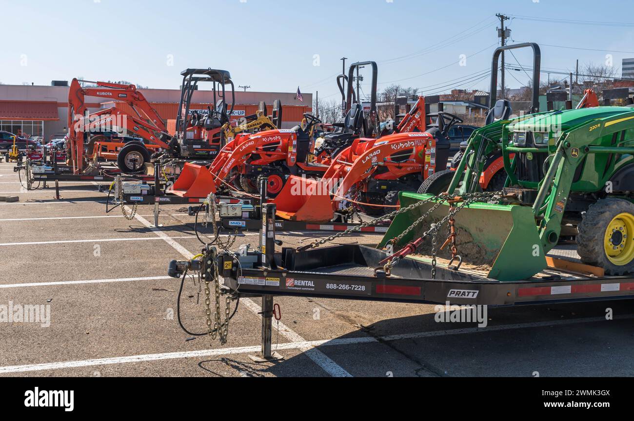 Heavy construction machinery available for rent in the parking lot of ...