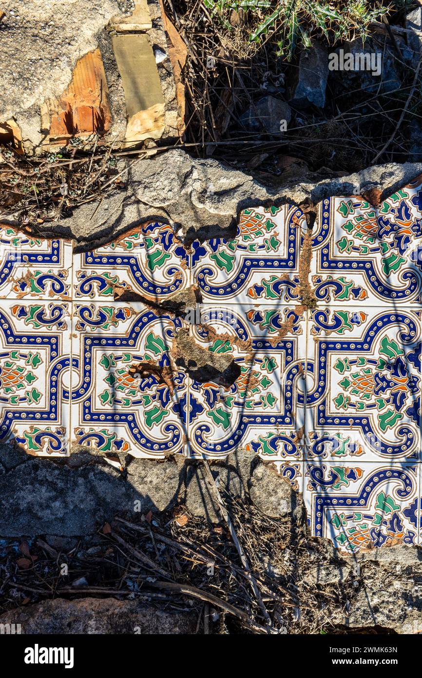Spanish broken tiles on the ground Stock Photo - Alamy