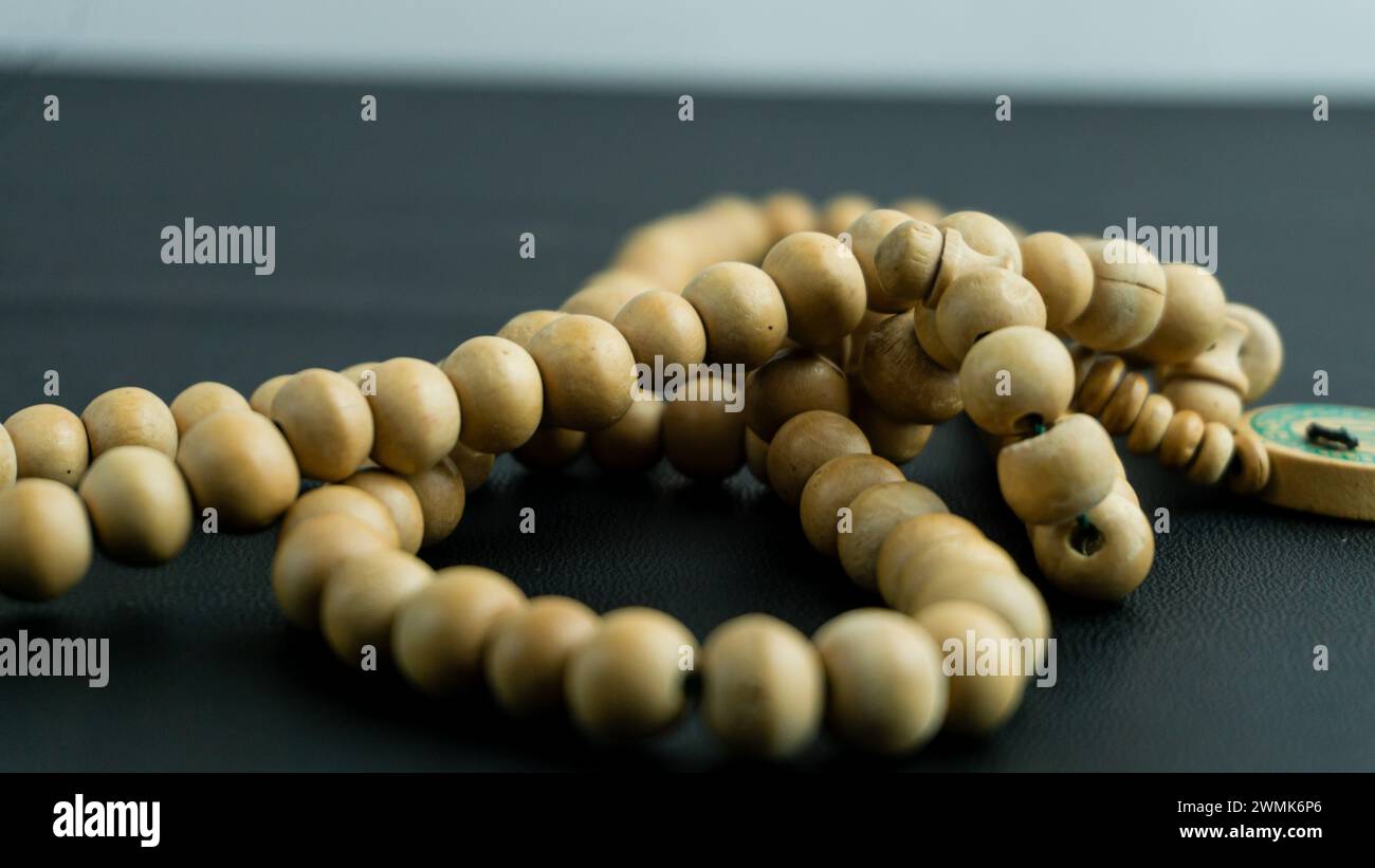 Tasbih made of wood to be used for dhikr dzikir on black background ...