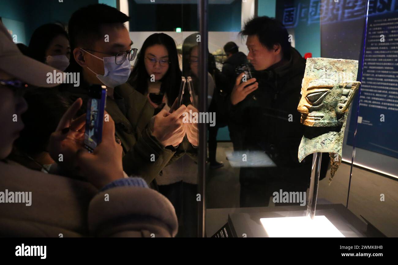 SHANGHAI, CHINA - FEBRUARY 26, 2024 - Gold mask with bronze head on ...