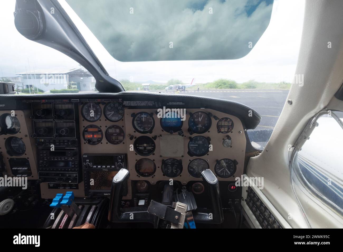 Internal view of the cockpit of a small plane about to take off at the ...