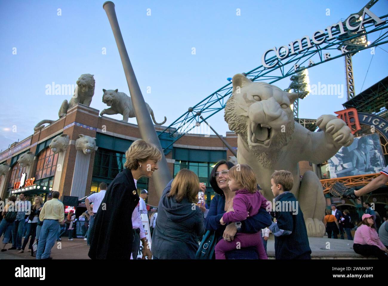 Baseball fans wait outside a stadium for a baseball game in Detroit ...