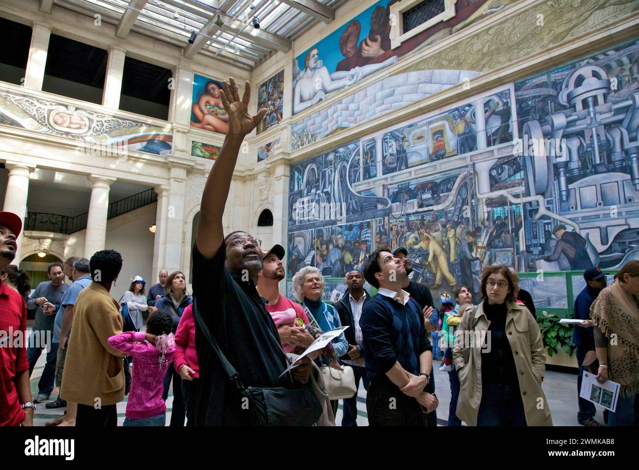 Tourists admire the Detroit Industry Murals by Mexican artist Diego ...