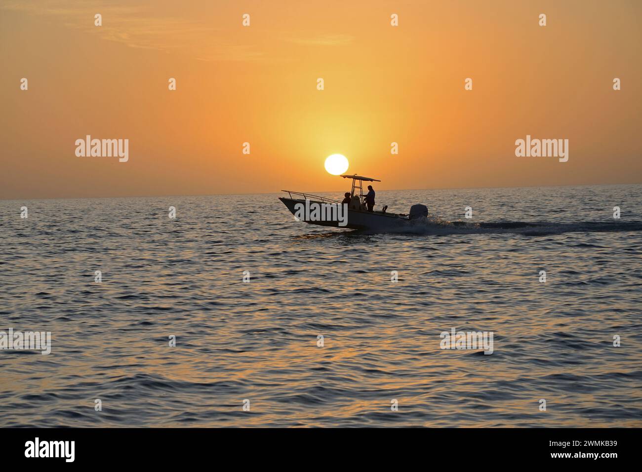 Boating on Lake Ontario at sunset Stock Photo - Alamy