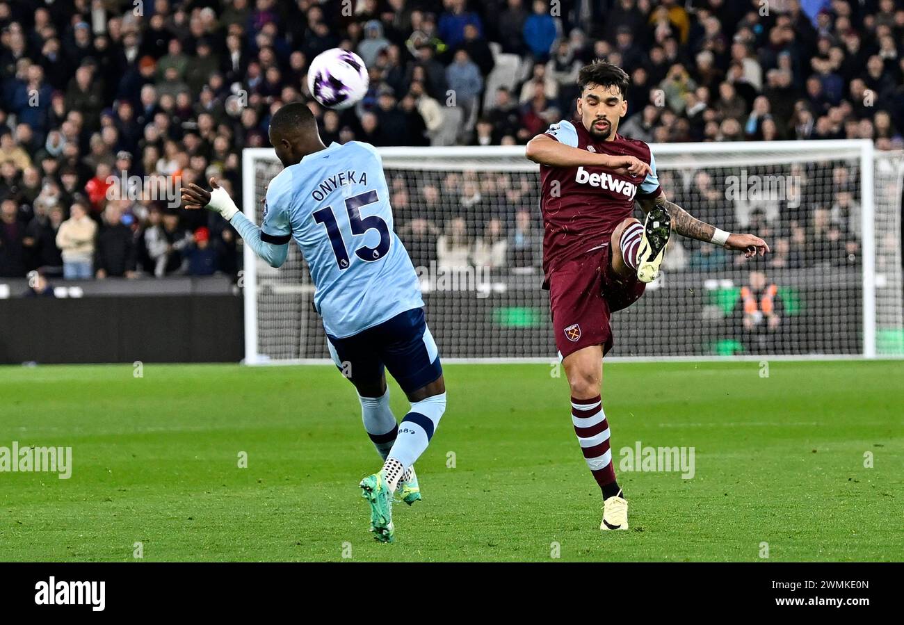 London, UK. 26th Feb, 2024. Lucas Paquetá (West Ham) clears as Frank ...