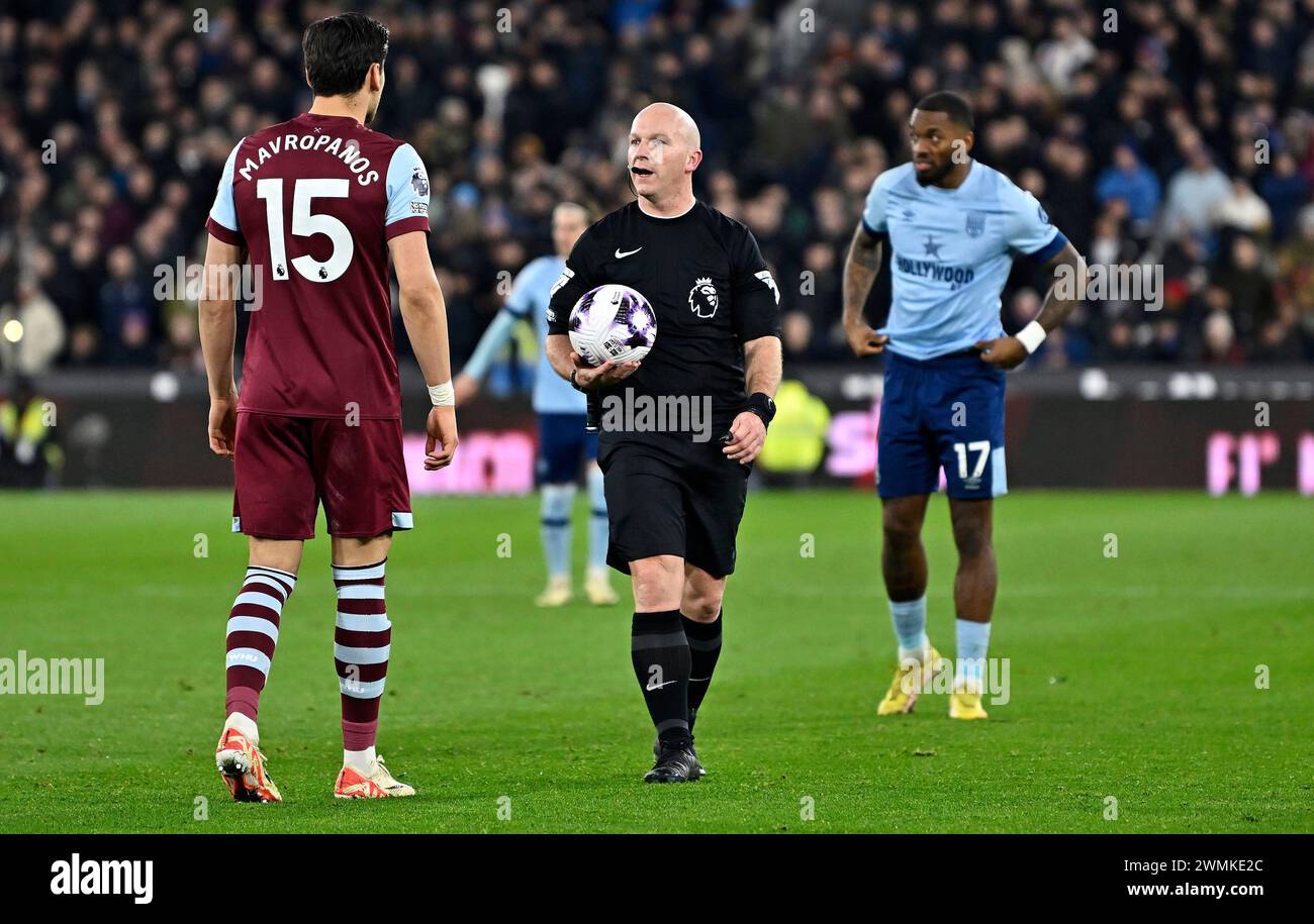 London, UK. 26th Feb, 2024. Simon Hooper (Referee) walks towards ...