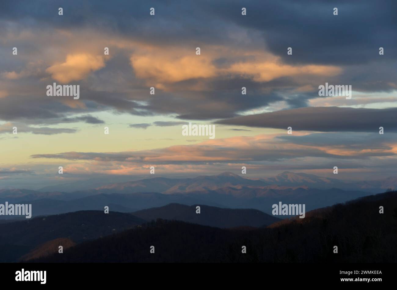 Sunset colored clouds over the Blue Ridge Mountains, Mount Pisgah and ...