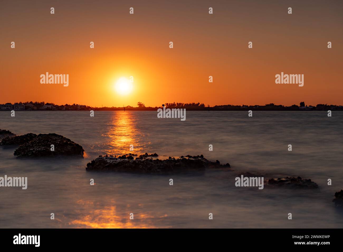 Orange sunset at Siesta Key beach with sunshine, Sarasota, Florida ...